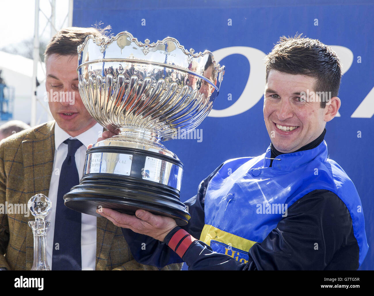 Robert Dunne celebrates after winning the Coral Scottish Grand National ...