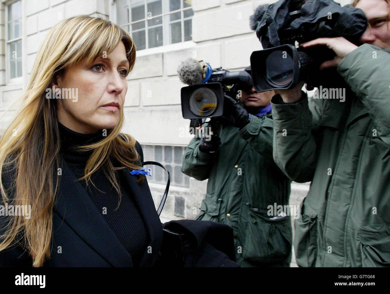 Mary Wragg leaves after giving evidence at the trial of husband Andrew ...