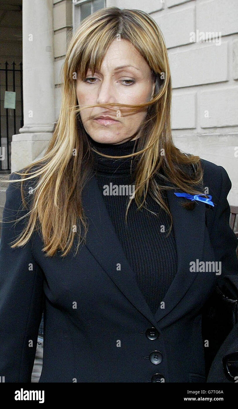 Mary Wragg leaves after giving evidence at the trial of husband Andrew ...