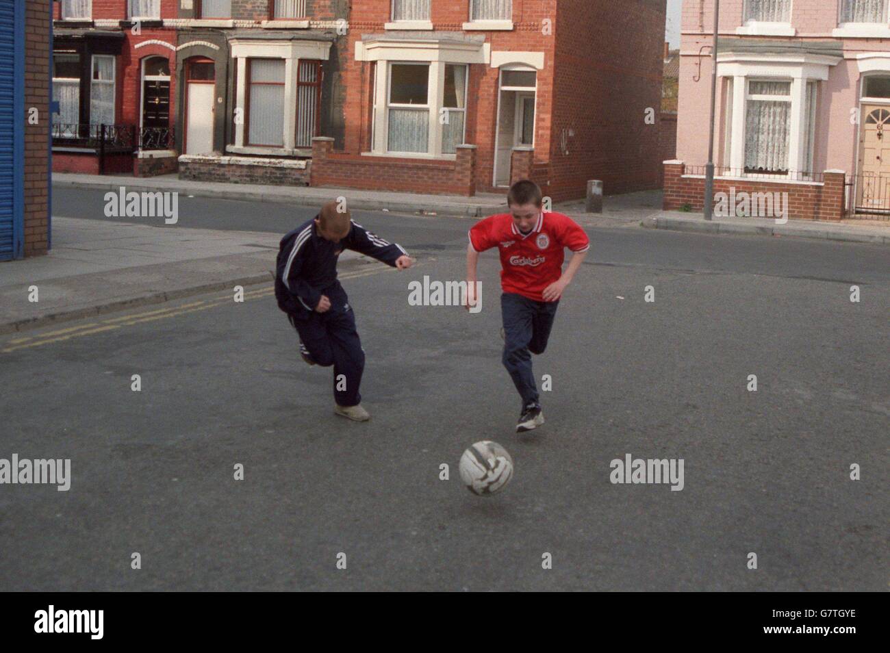 Soccer children playing football outside goodison park hi-res stock ...
