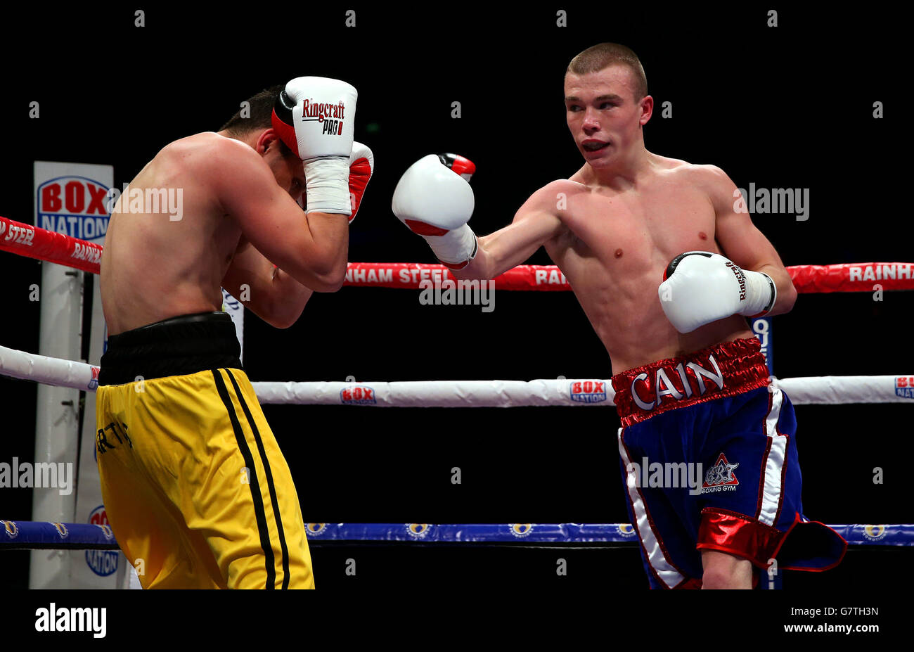 Andrew Cain and Patrick Bartos fight in the International Flyweight ...