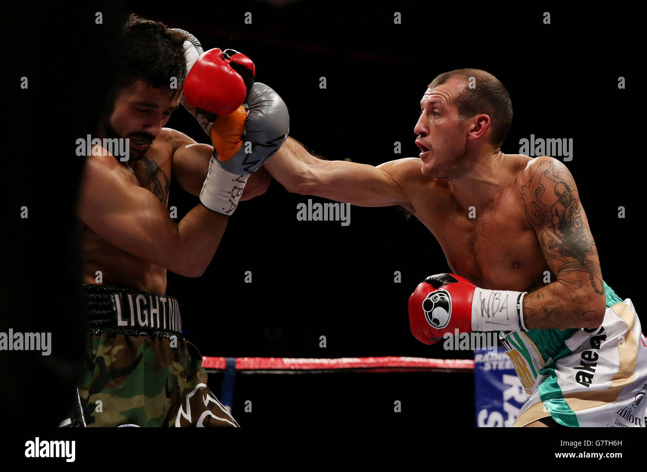Boxing - Liverpool Echo Arena. Derry Mathews (right) and Tony Luis in ...