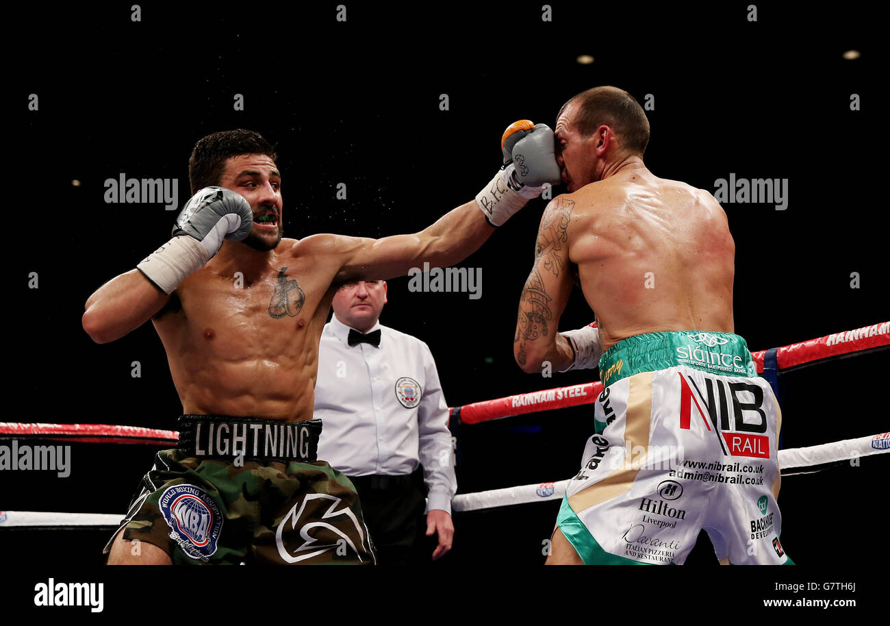 Derry Mathews (right) is punched by Tony Luis in their Vacant WBA ...