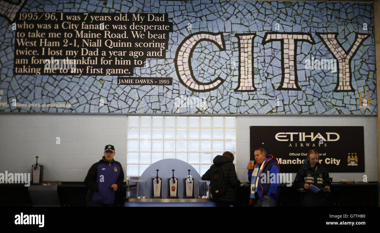 General view as fans enjoy refreshments at the Etihad Stadium Stock ...