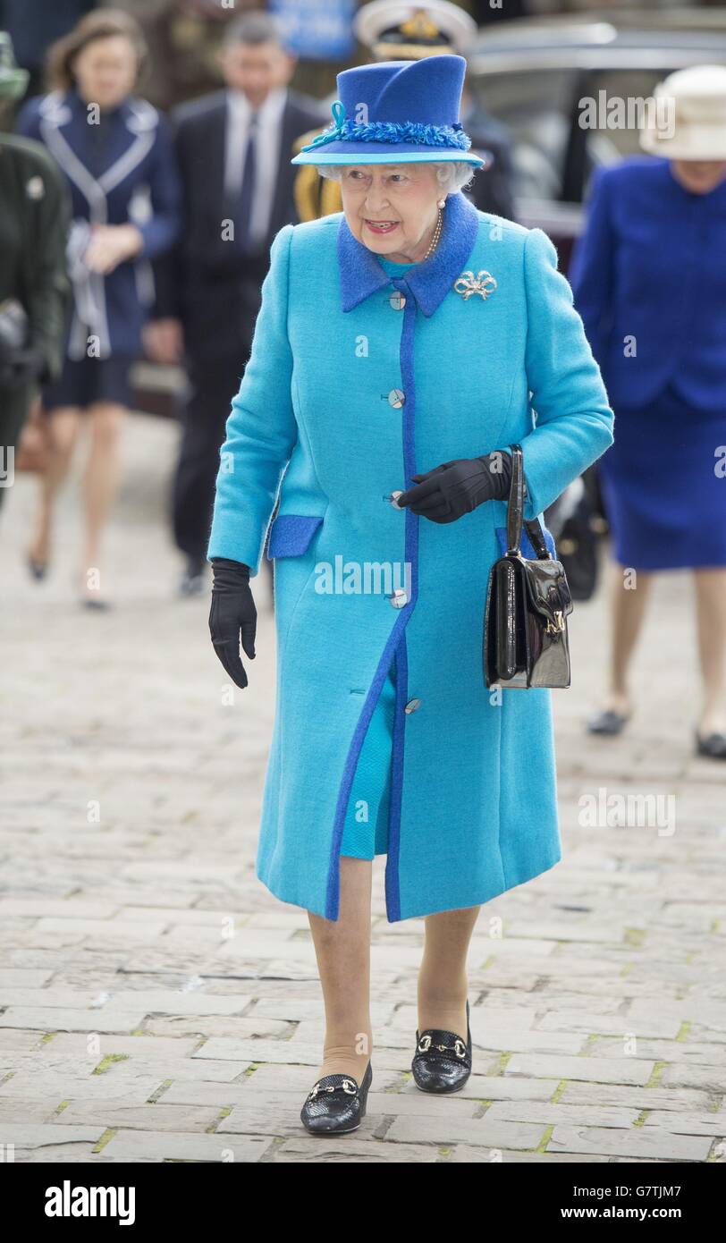 Queen Elizabeth II attends a ceremony to unveil statues of herself and ...