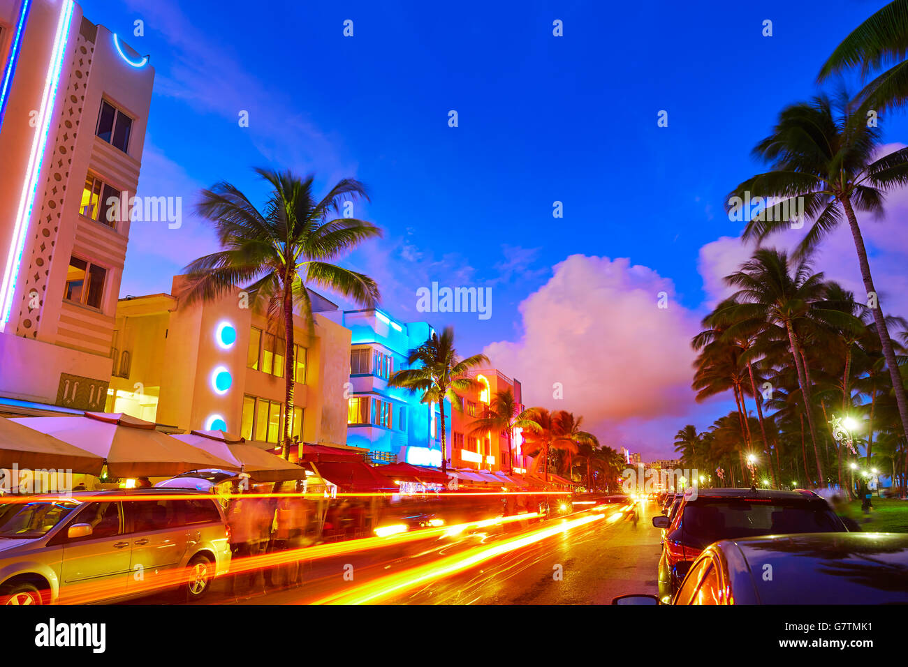 Miami Beach South Beach sunset in Ocean Drive Florida Art Deco and car ...