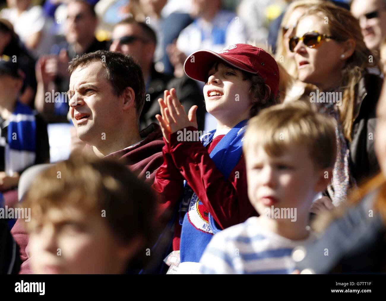 Young reading fans in the stands hi-res stock photography and images ...