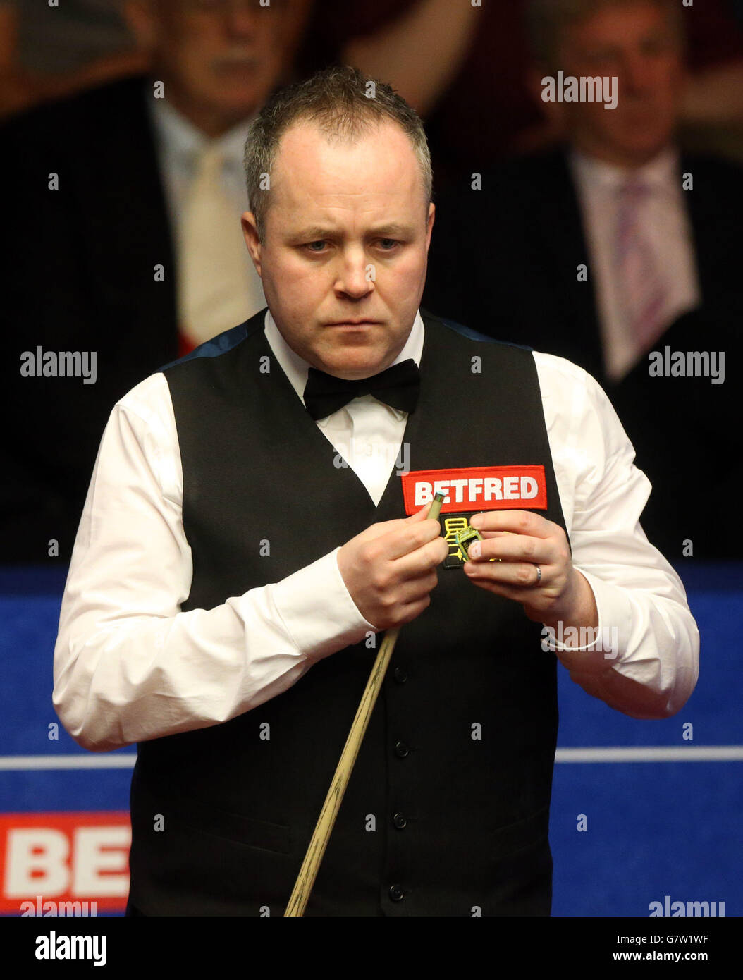 John Higgins in action against Ding Junhui during day six of the ...