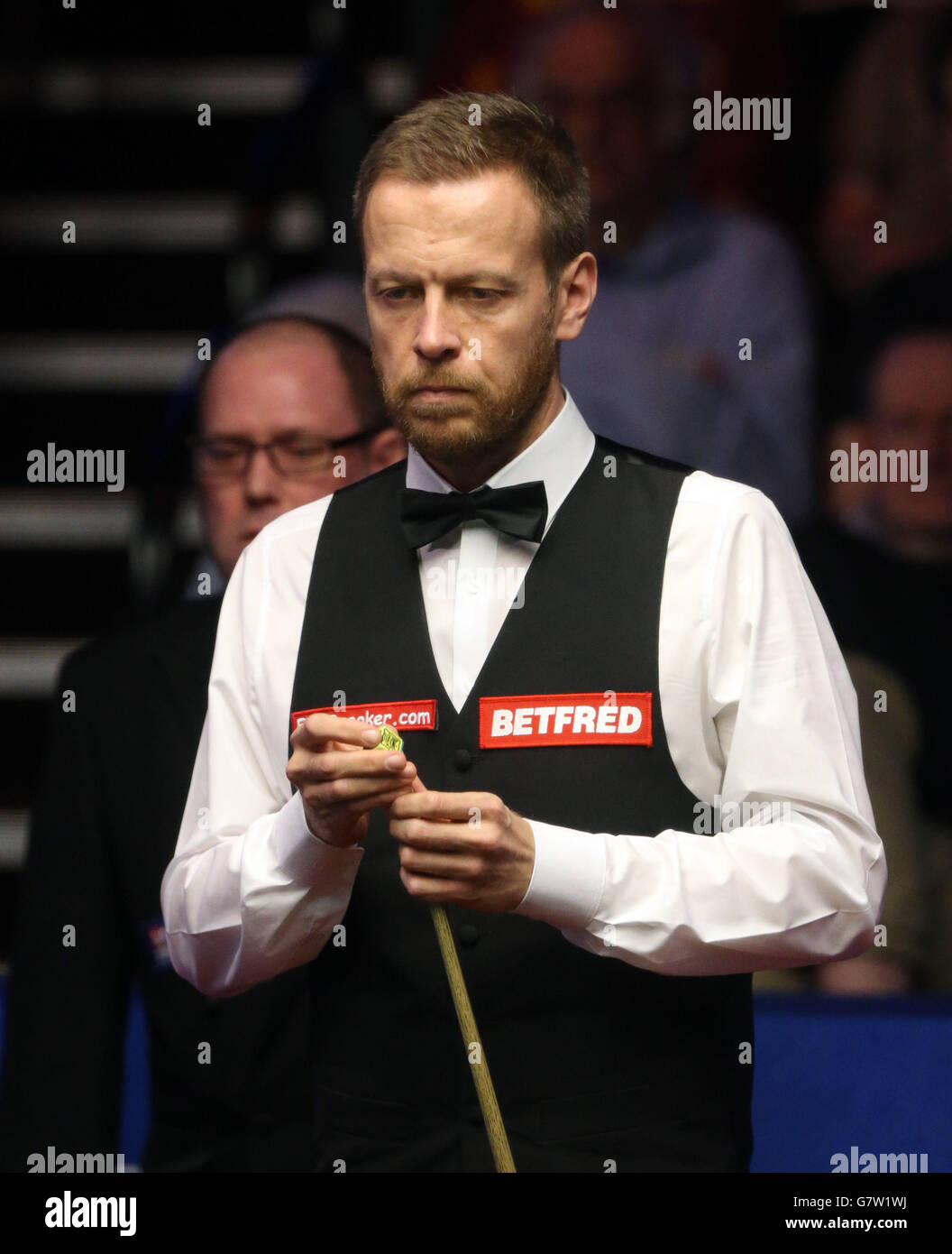 Robin Hull in action against Shaun Murphy during day six of the Betfred ...