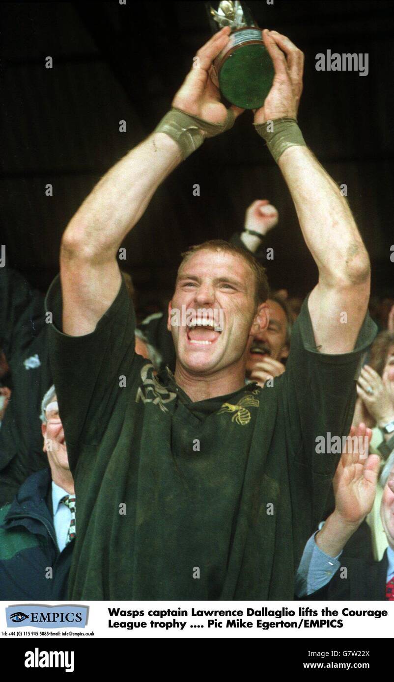 Wasps captain Lawrence Dallaglio lifts the Courage League trophy Stock ...