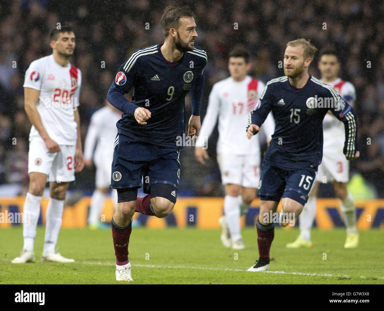 Scotland's Steven Fletcher (left) celebrates his second goal during the ...