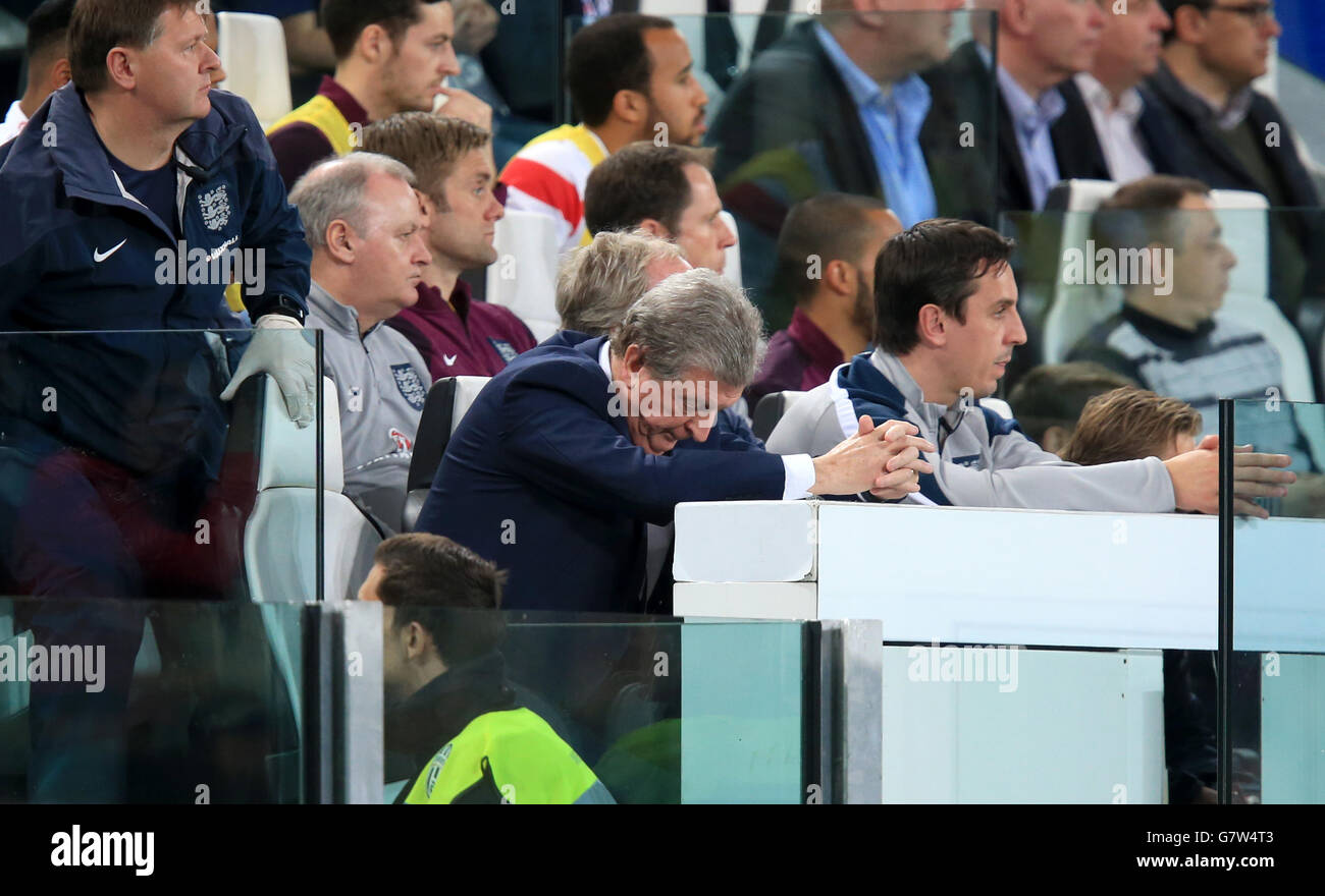 England manager Roy Hodgson dejected as he sits in the dugout during ...