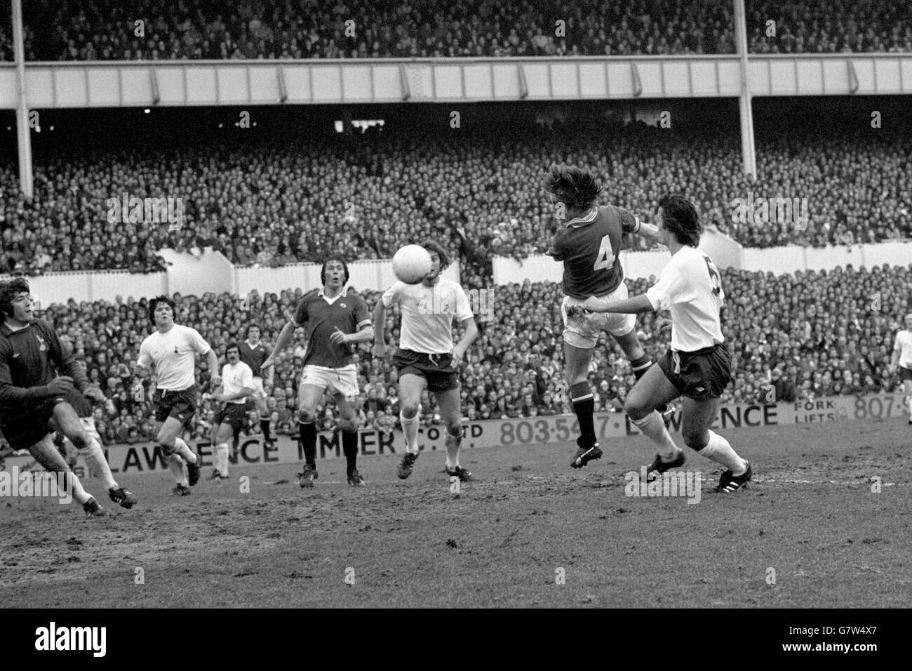 Manchester United's Sammy McIlroy (second r) heads his team's second ...