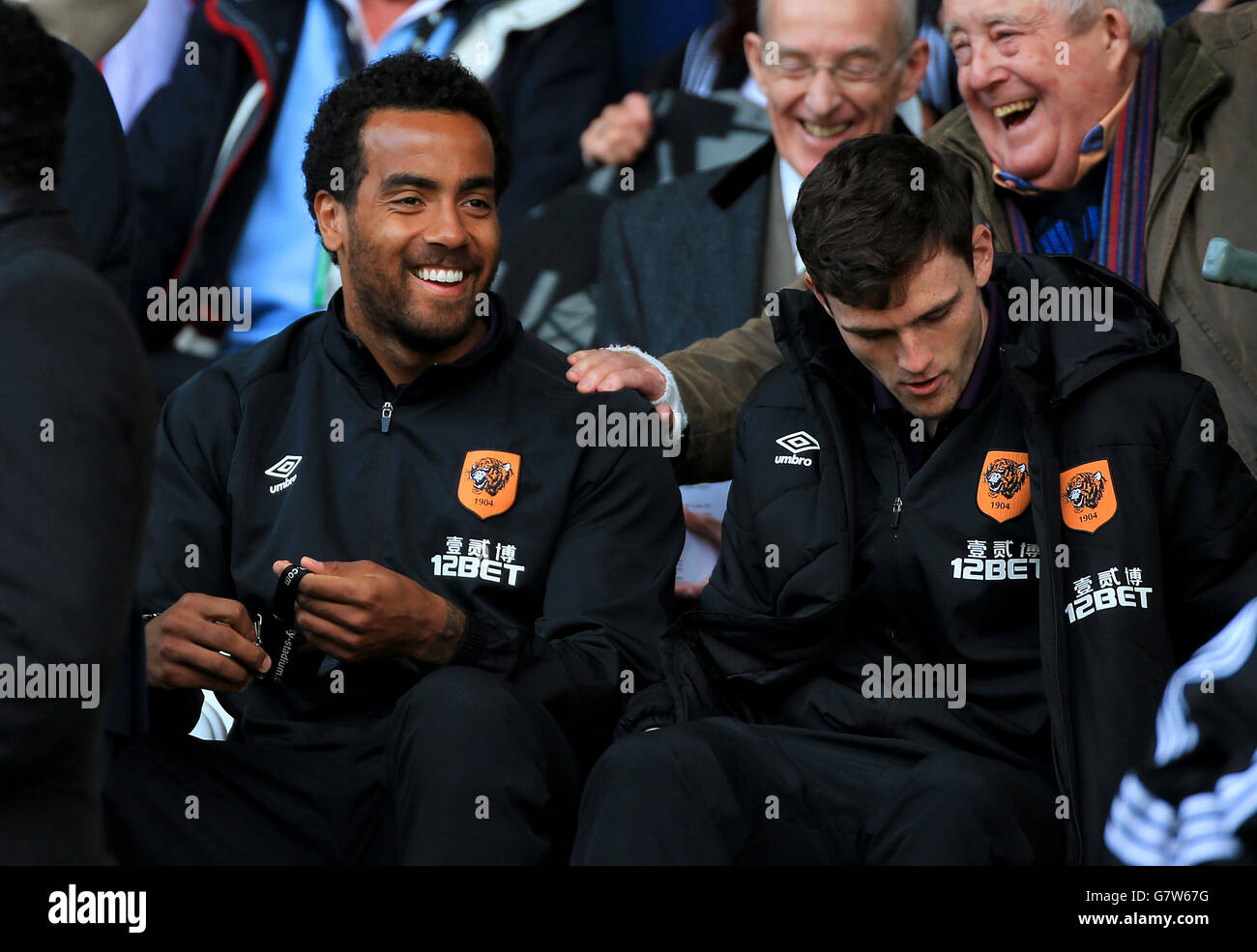 Hull City's Tom Huddlestone (left) and Andrew Robertson in the stands ...