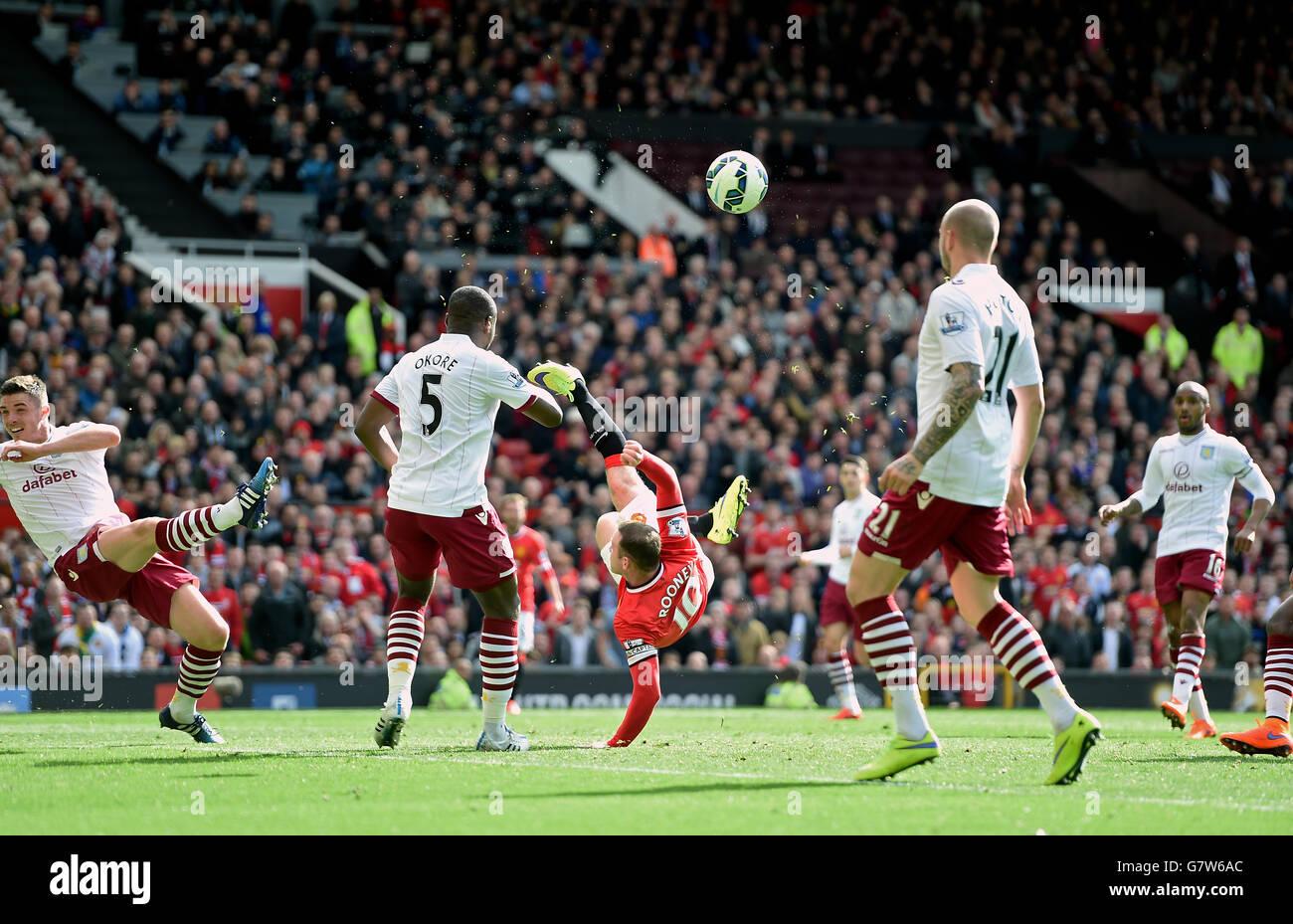 Attempts an overhead kick hi-res stock photography and images - Alamy