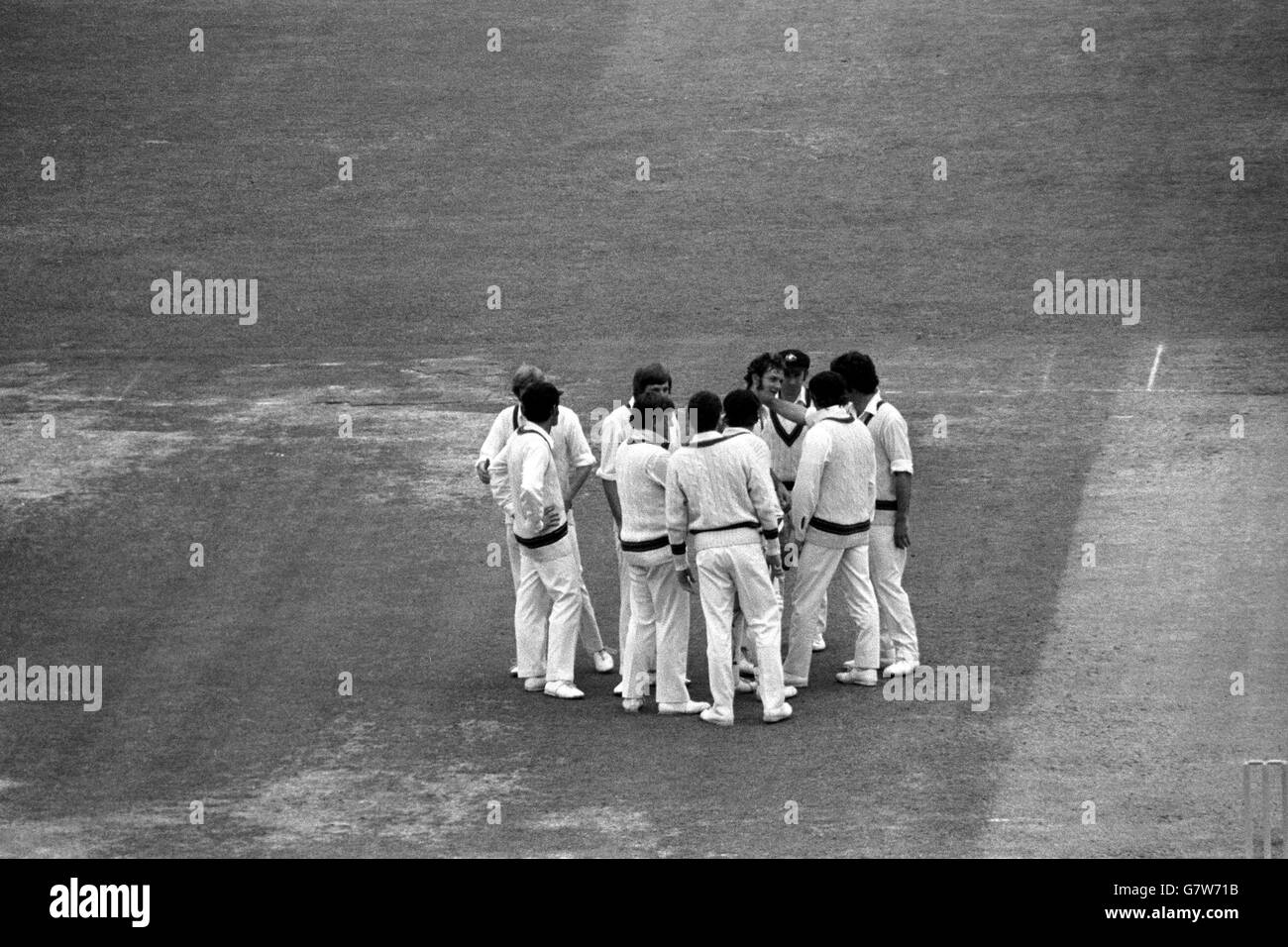 Teammates clustered round Test newcomer Bob Massie Australia's 25-year ...