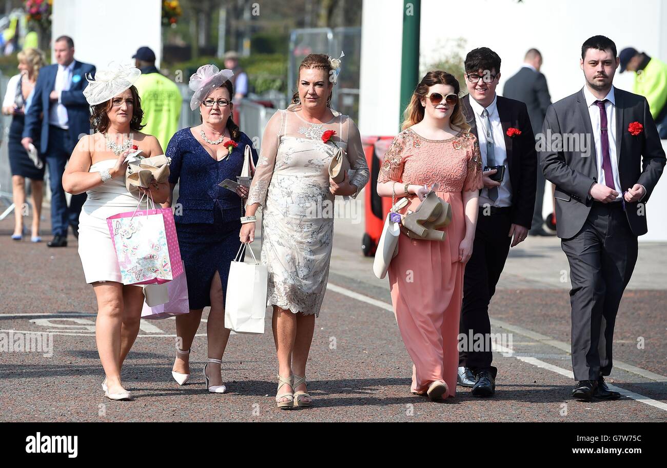 Racegoers arrive at Aintree on the Grand Opening Day of the Crabbies ...