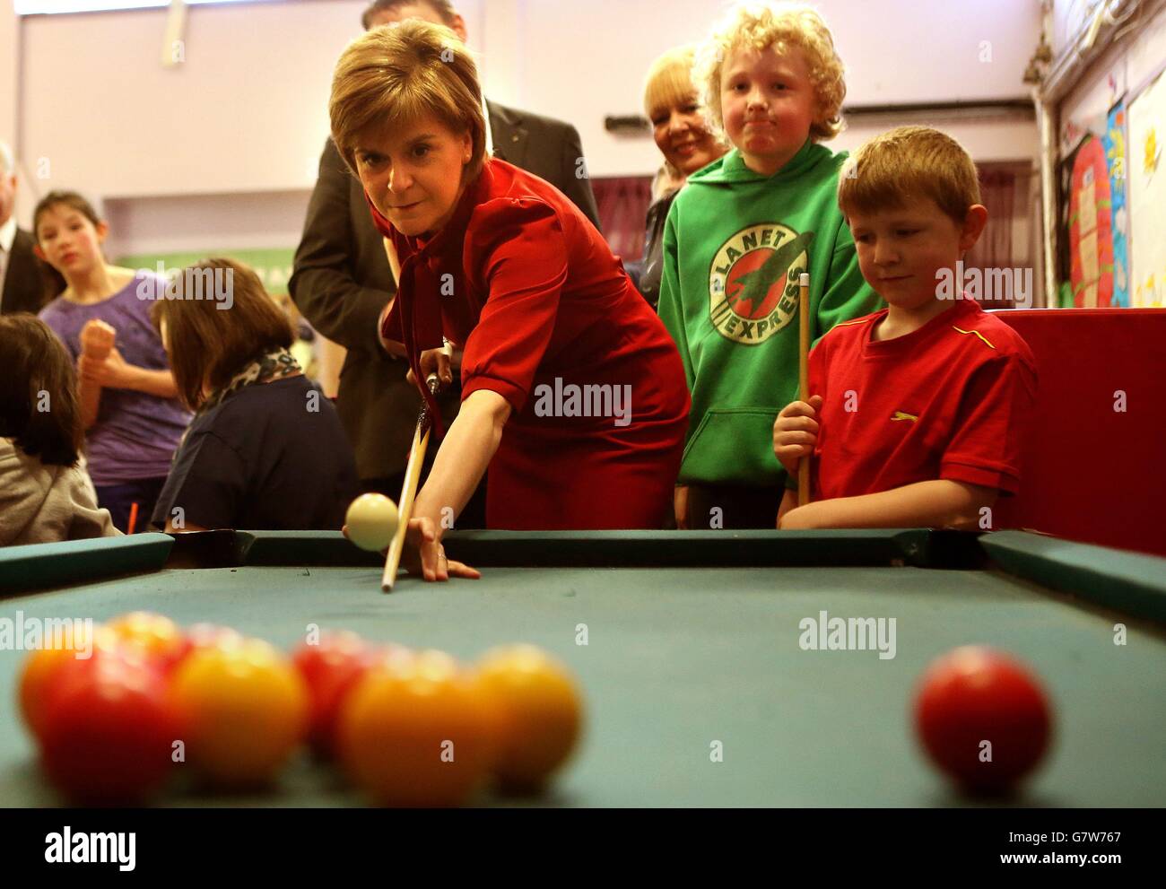 First Minister Nicola Sturgeon takes a shot on the pool table during a ...