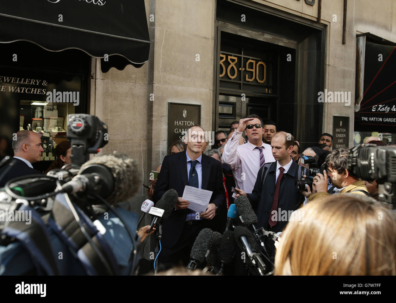 Scotland Yard Flying Squad Detective Chief Inspector Paul Johnson reads ...