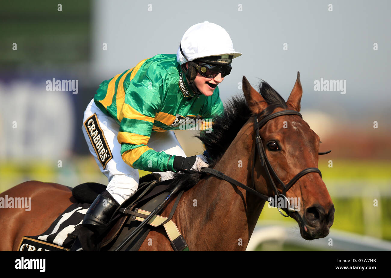 Jockey Nina Carberry is all smiles after winning the Crabbie's Fox ...