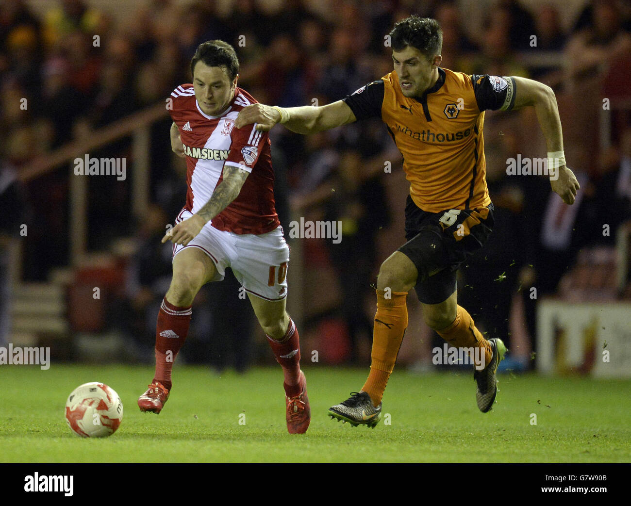 Middlesbrough's Lee Tomlin and Wolves Danny Batth (right) battle for ...