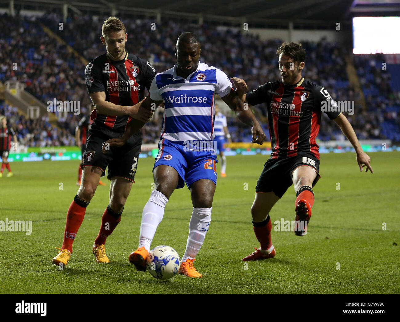 Reading's Yakubu and AFC Bournemouth's Simon Francis (L) and Adam Smith ...