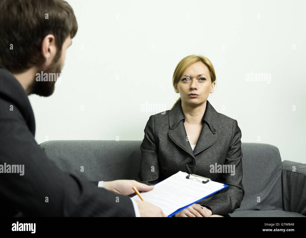 man in a business suit holding a job interview. Ready for interview ...