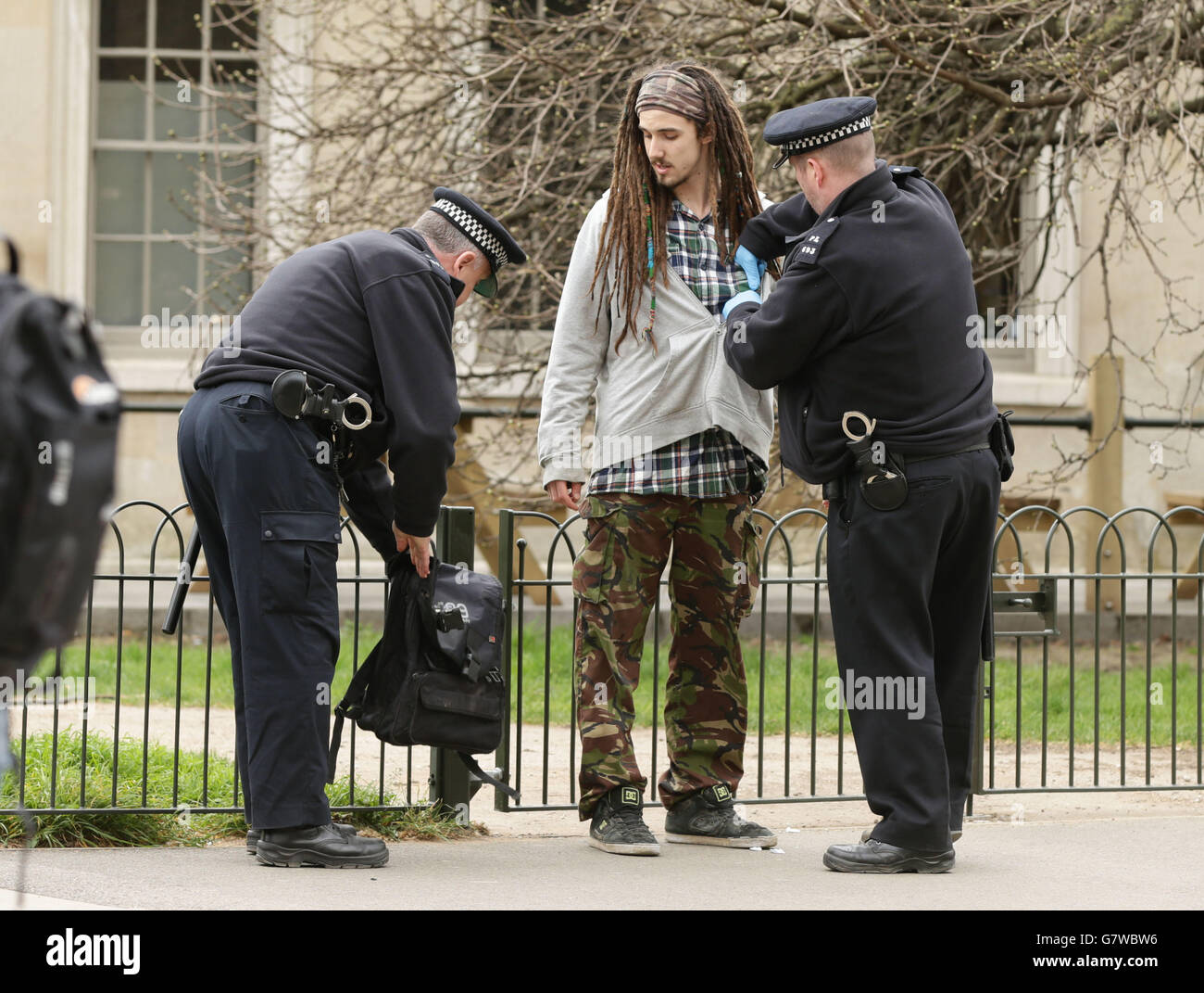 A man is searched at an entrance to Hyde Park, central London, during a ...