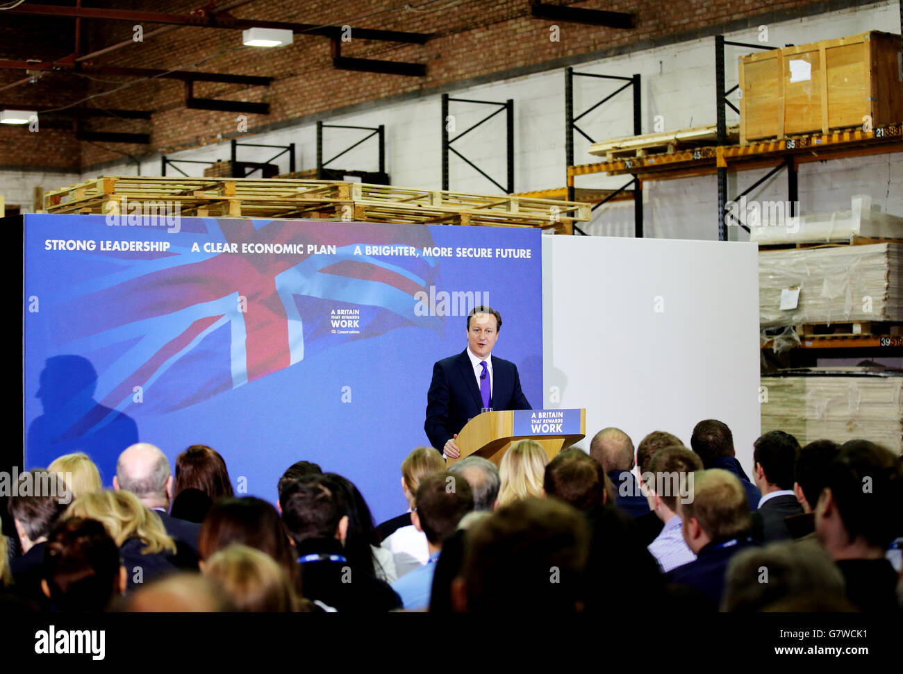 Prime Minister David Cameron, speaks to workers at Dunster House during ...