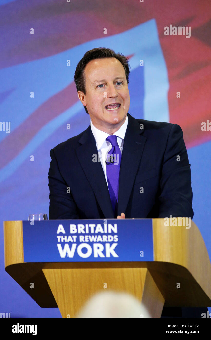 Prime Minister David Cameron, speaks to workers at Dunster House during ...
