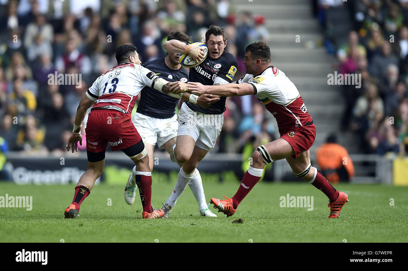 Rugbyu northampton ampics mangpa full length tackling hi-res stock ...