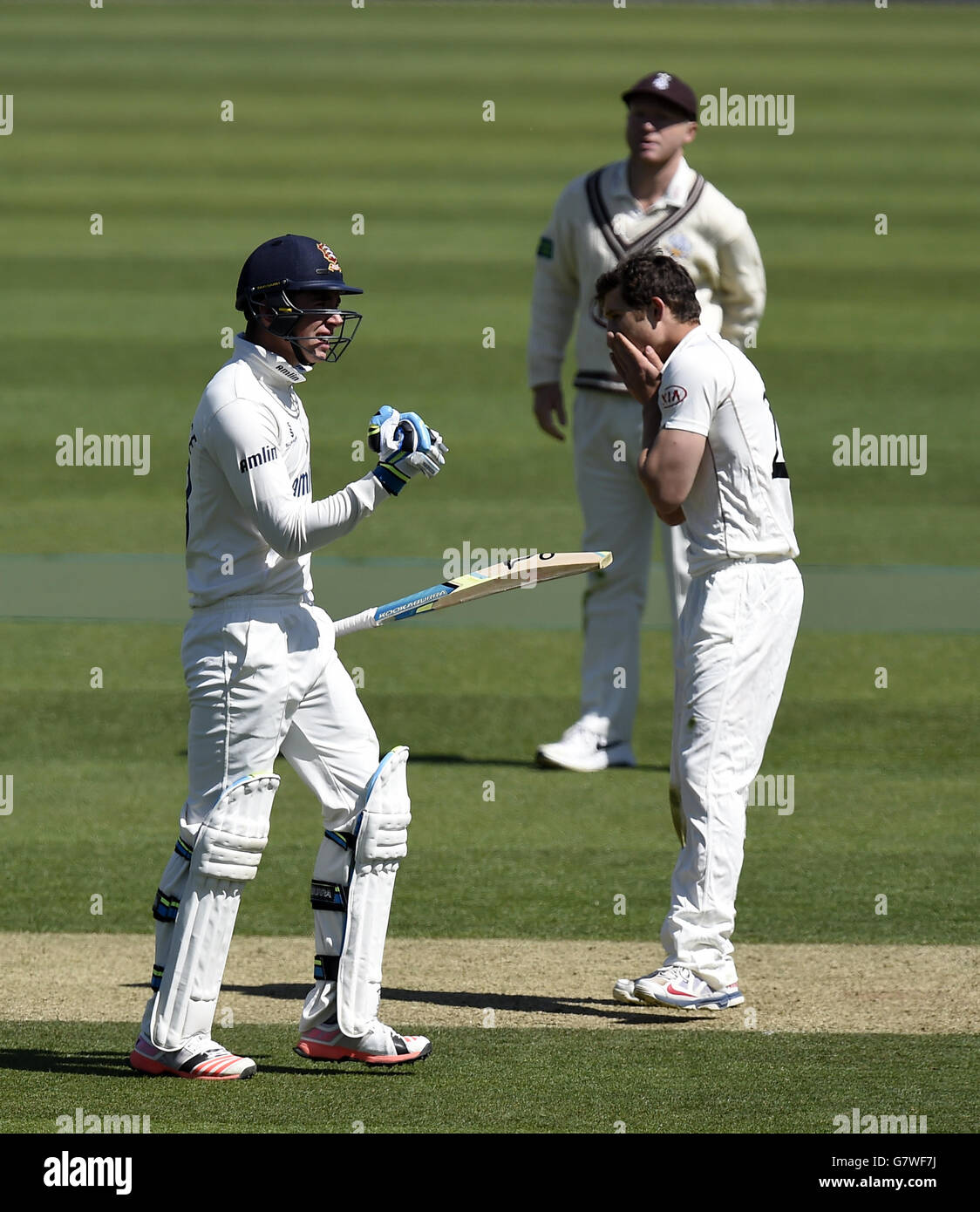 Daniel lawrence left celebrates reaching his maiden first class century ...