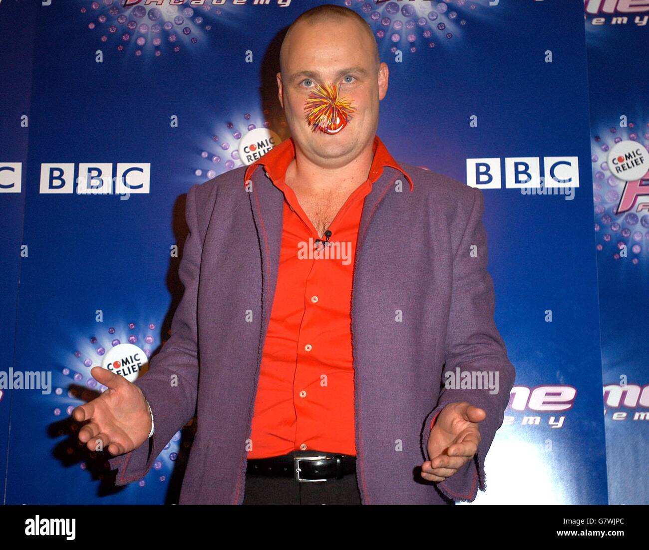 Comedian Al Murray poses with a red nose after being the first ...