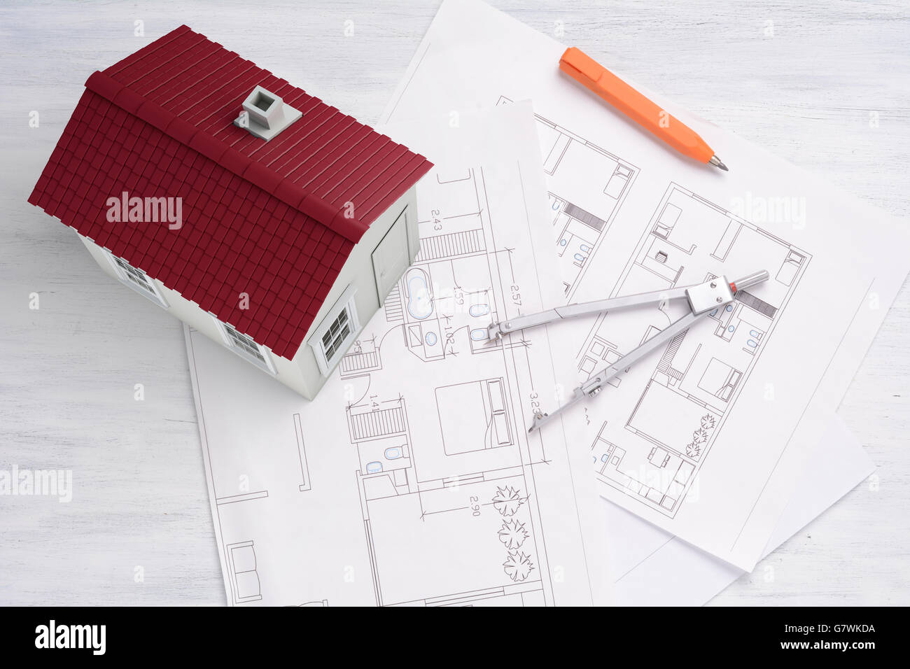 A house with house plan and tools. Architecture Concept Stock Photo - Alamy