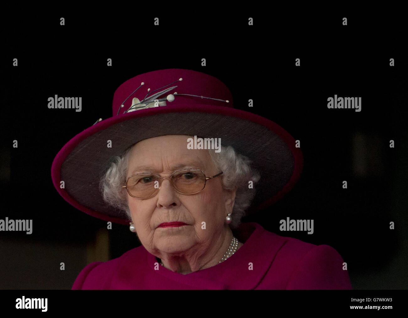 Queen Elizabeth II watches the horse racing at the Dubai Duty Free ...