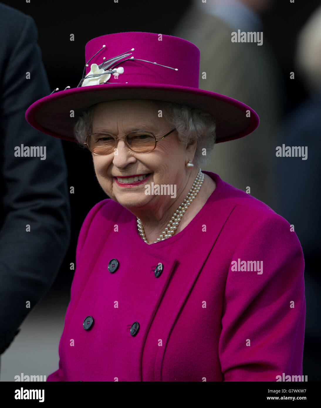 Queen Elizabeth II watches the horse racing at the Dubai Duty Free ...