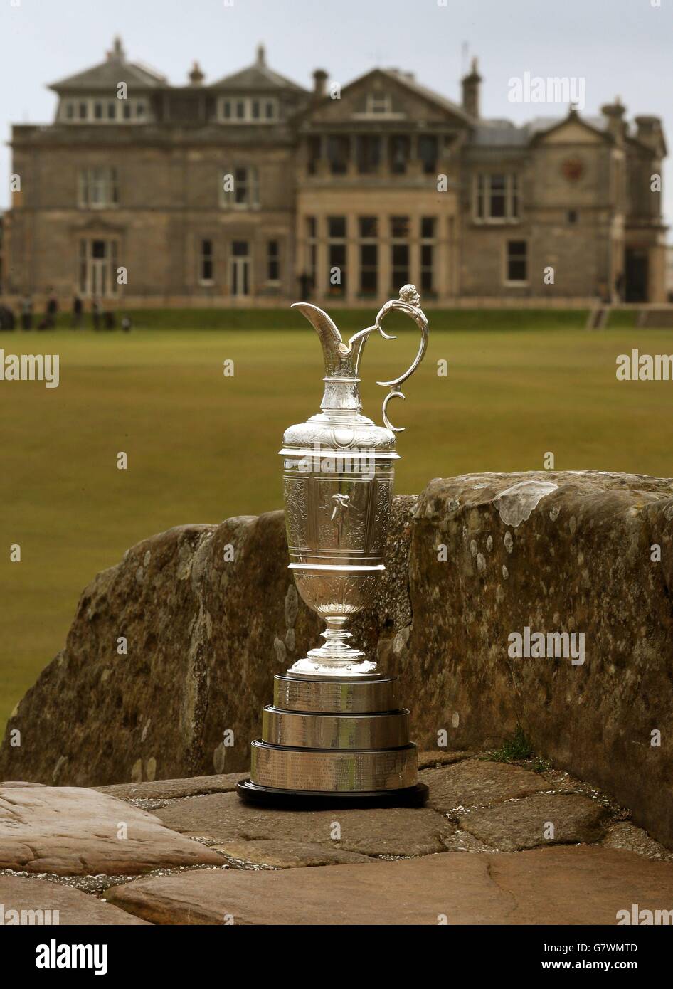 The Claret Jug trophy sits by the Swilcan Bridge in front of the ...