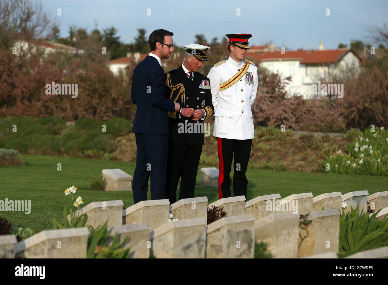 The Prince of Wales and Prince Harry are given a tour of war graves at ...