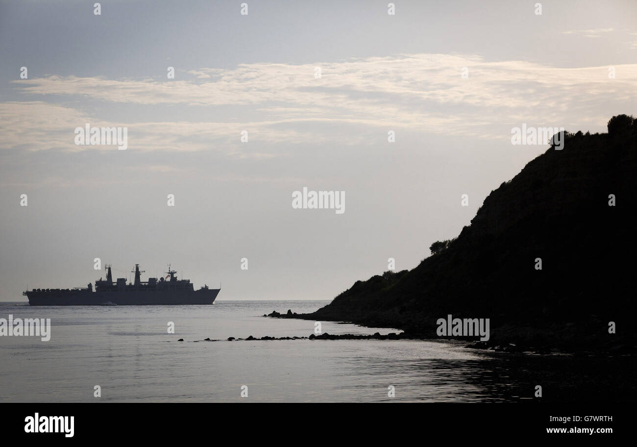 HMS Bulwark off the coast of V Beach by V Beach cemetery, close to the ...