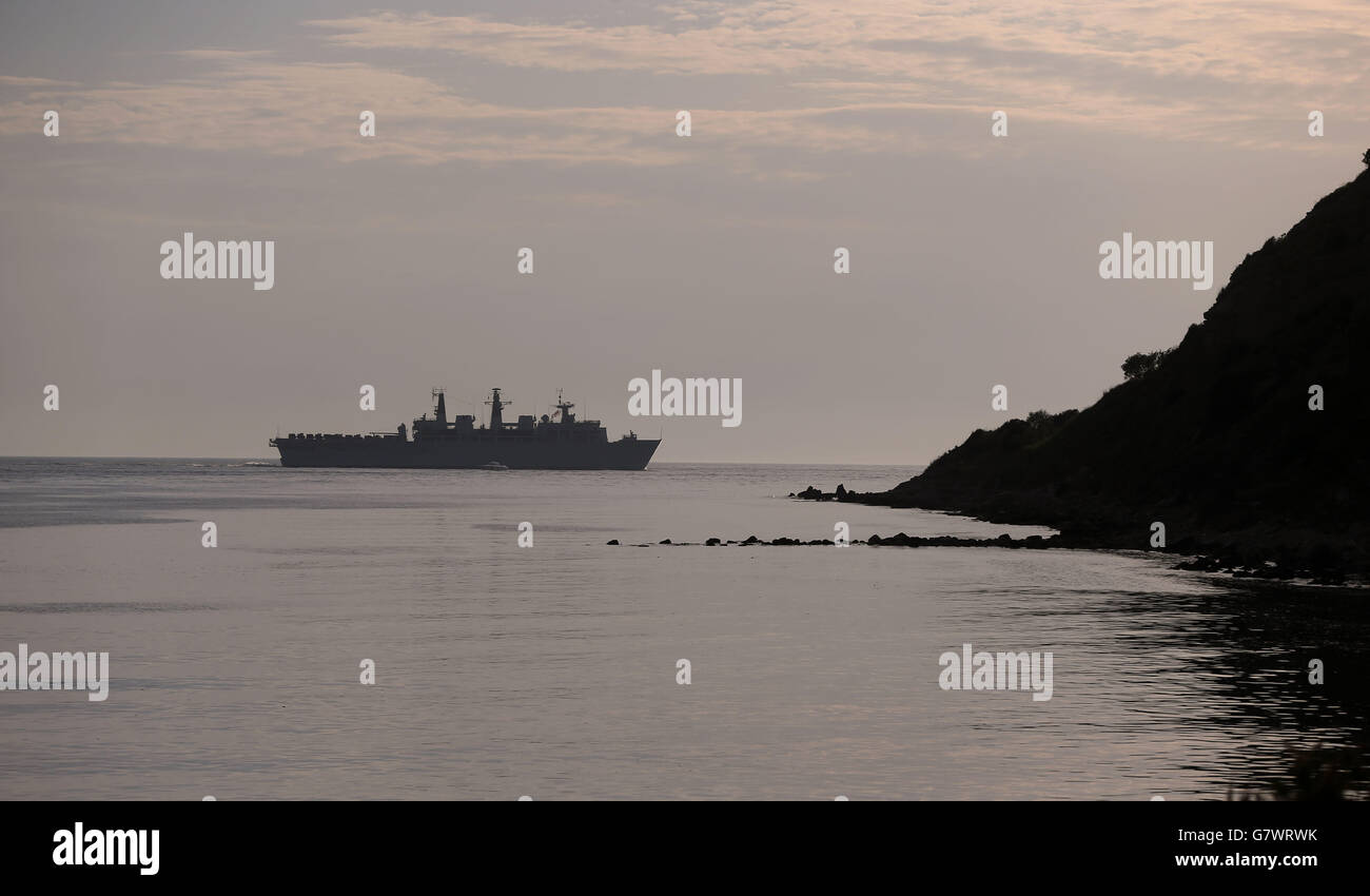 HMS Bulwark off the coast of V Beach by V Beach cemetery, close to the ...