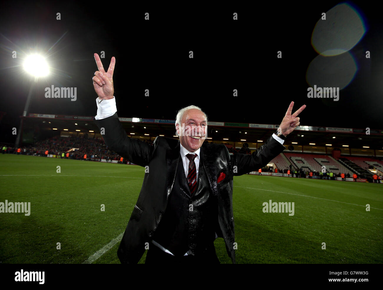 Bournemouth Chairman Jeff Mostyn celebrates on the pitch after the ...