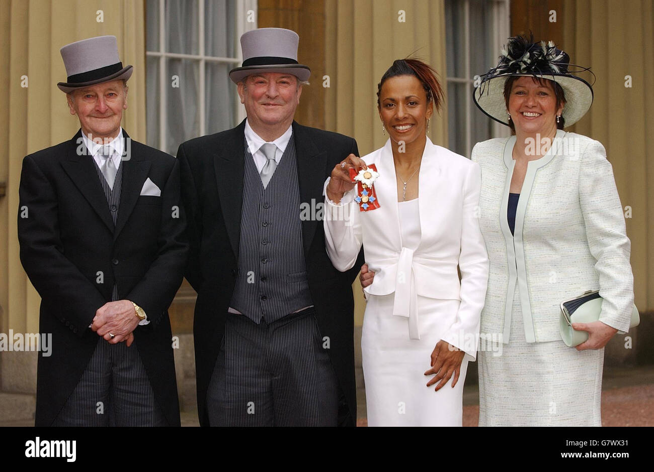 Double Olympic gold medallist Dame Kelly Holmes (second right) with her ...