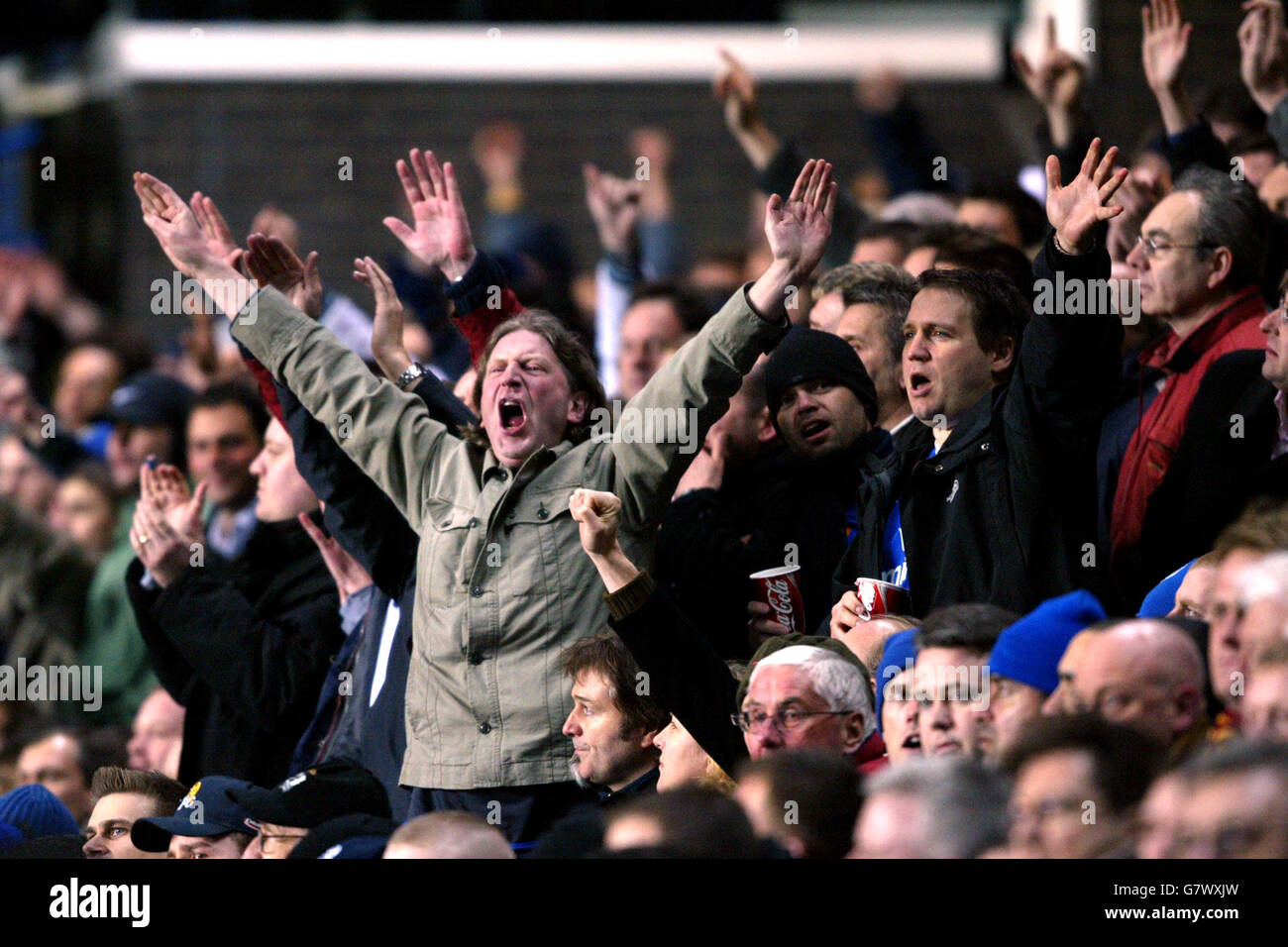Chelsea fans cheer on their team hi-res stock photography and images ...