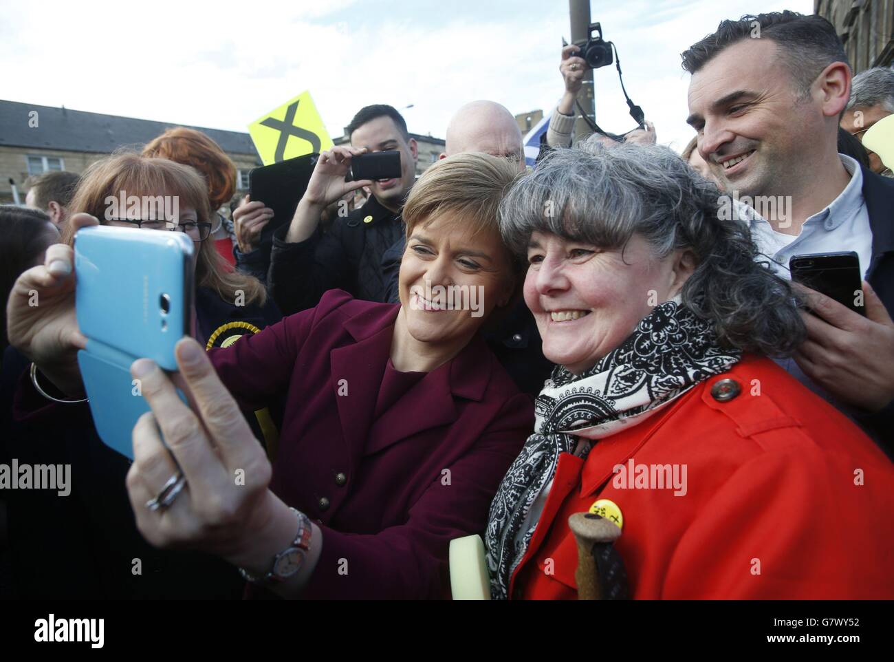 First Minister Nicola Sturgeon has her picture taken as she unveils the ...