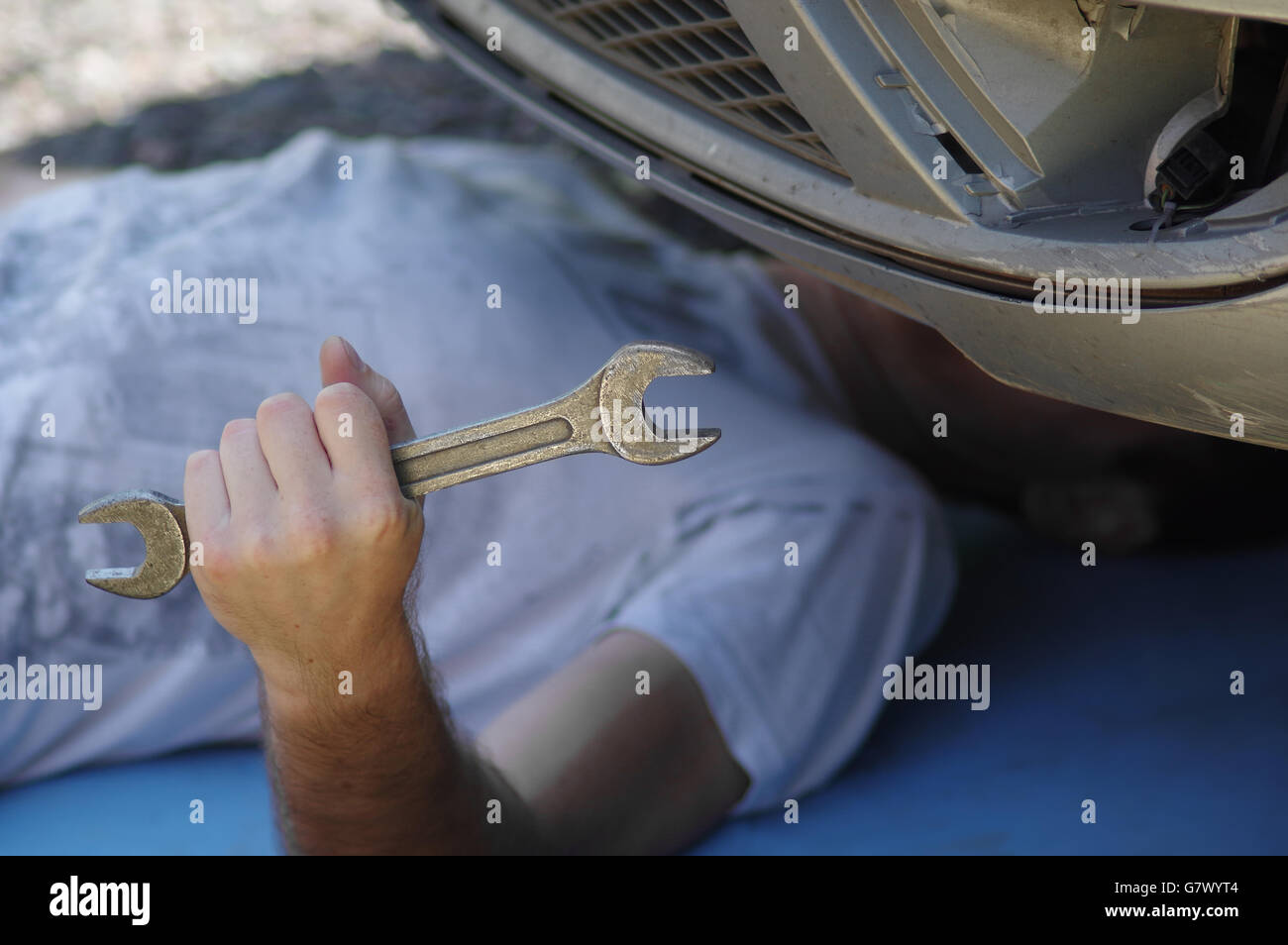 Man lying under car hi-res stock photography and images - Alamy