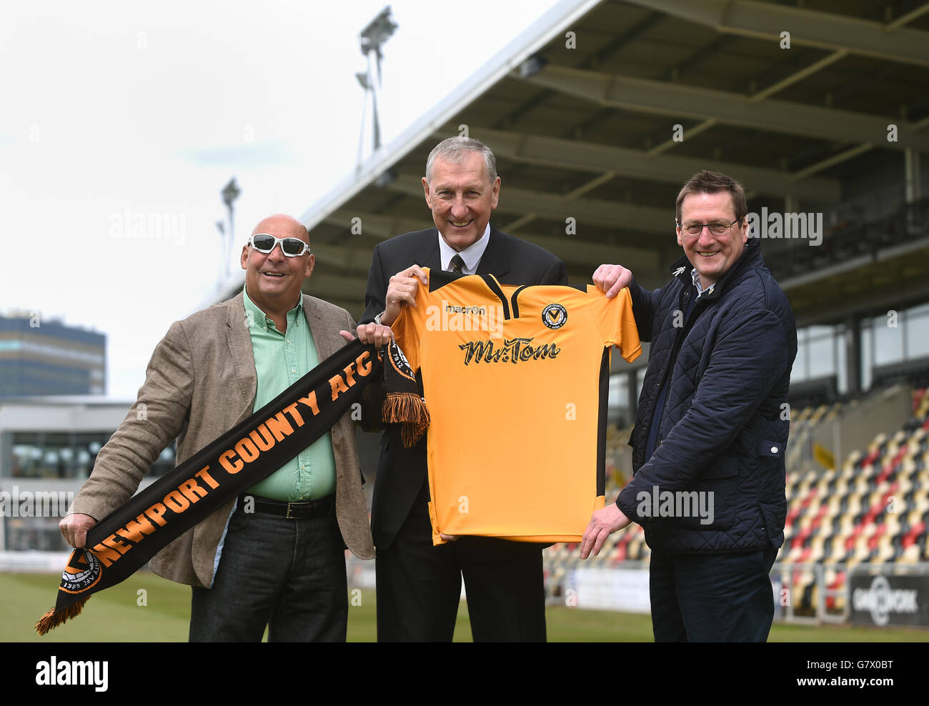 Newport County manager Terry Butcher (centre) poses for photos with ...