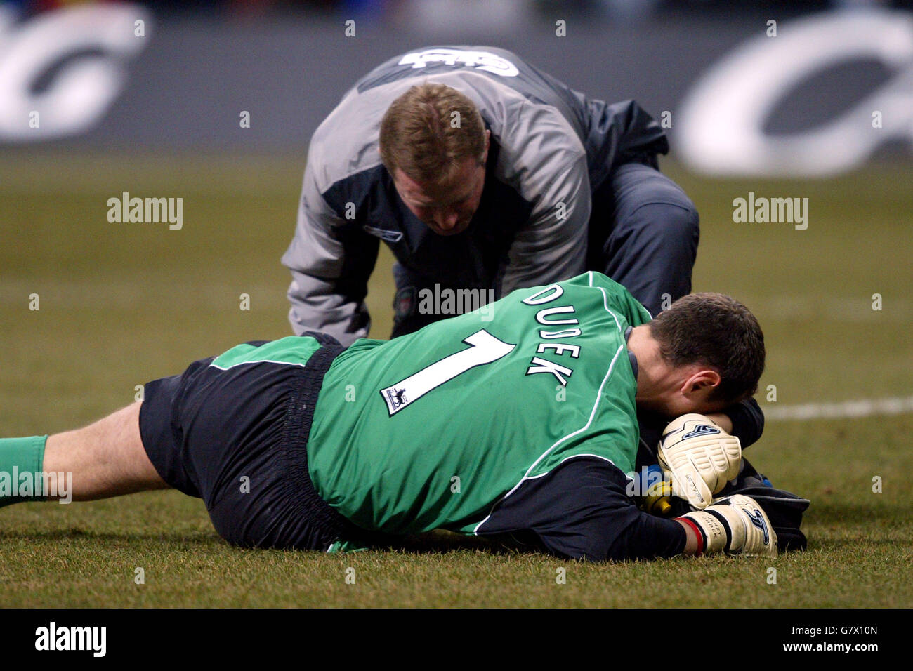 Liverpool physio Dave Galley treats goalkeeper Jerzy Dudek (floor Stock ...