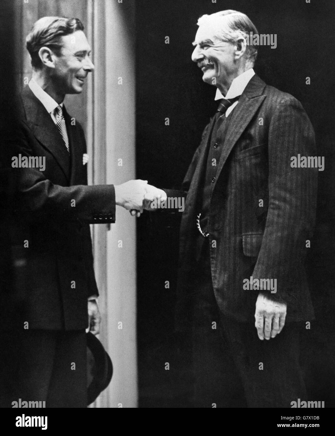King george vi shakes hands with prime minister neville chamberlain hi ...