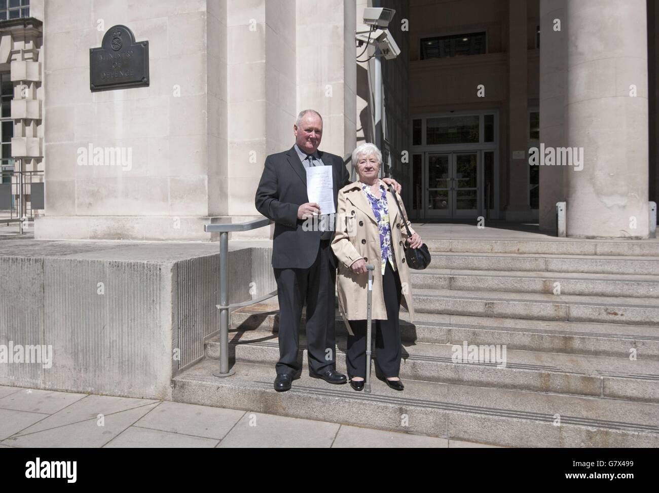 Mary Heenan and son Eugene Heenan stand outside outside the Ministry of ...