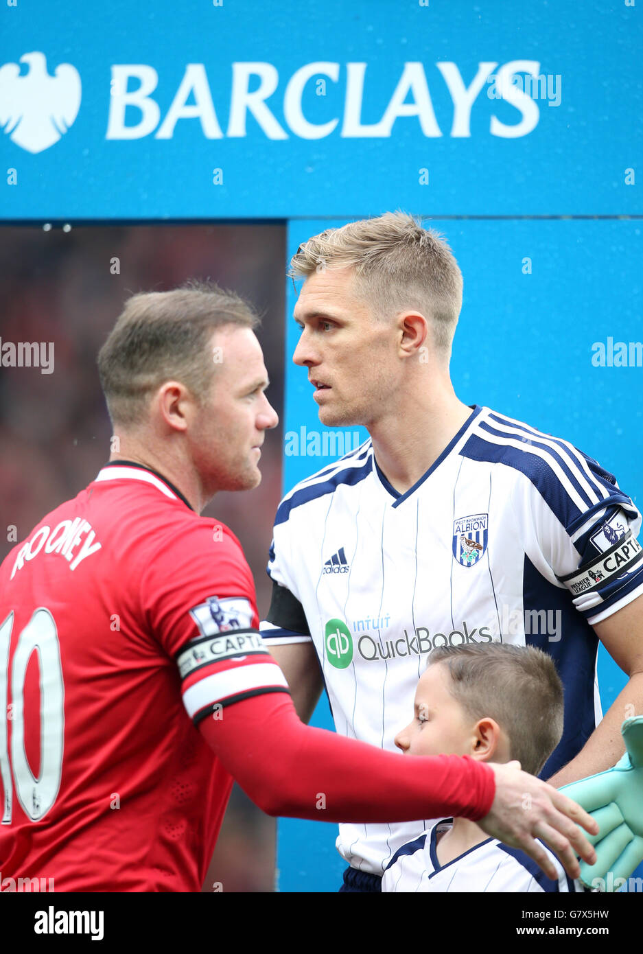 Manchester United captain Wayne Rooney and West Bromwich Albion captain ...